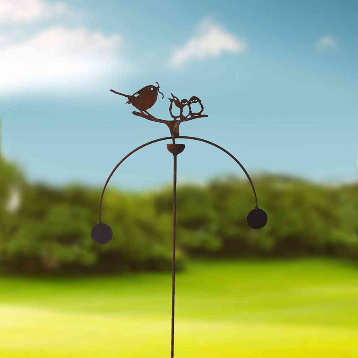 Wind rockers: Birds feeding spinning wind rocker
